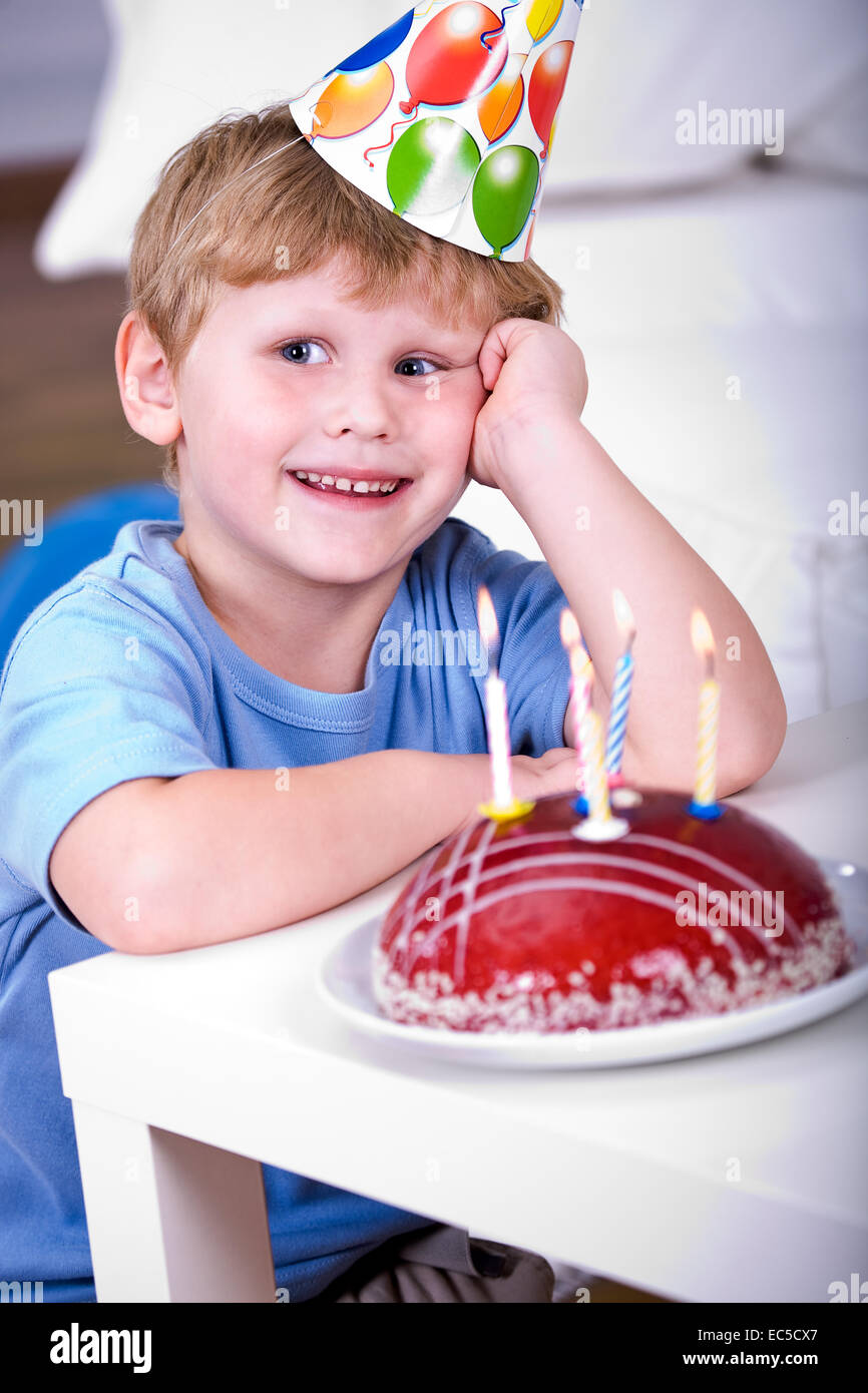 a little boy celebrating his birthday at home Stock Photo - Alamy