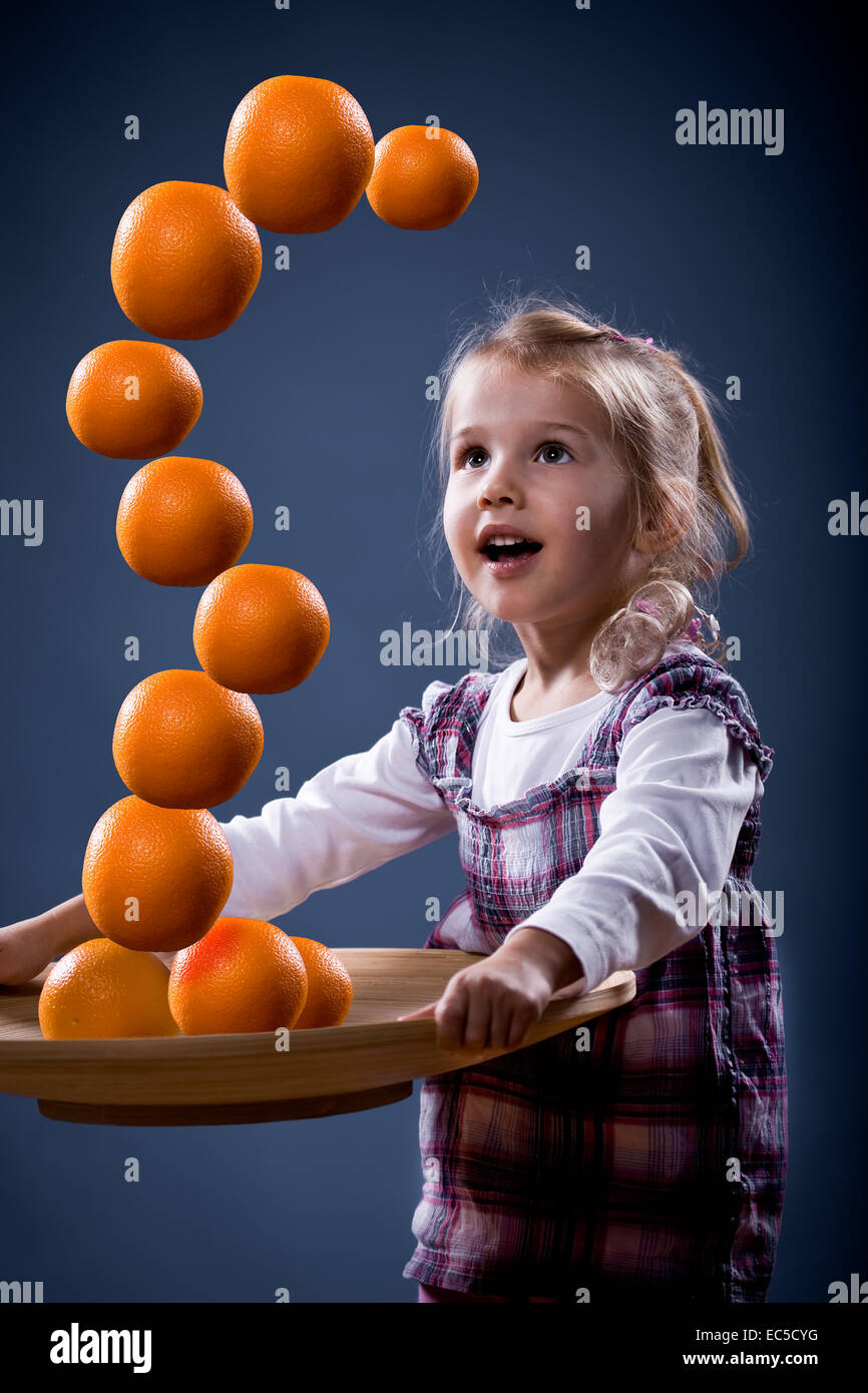 Balancing orange hi-res stock photography and images - Alamy