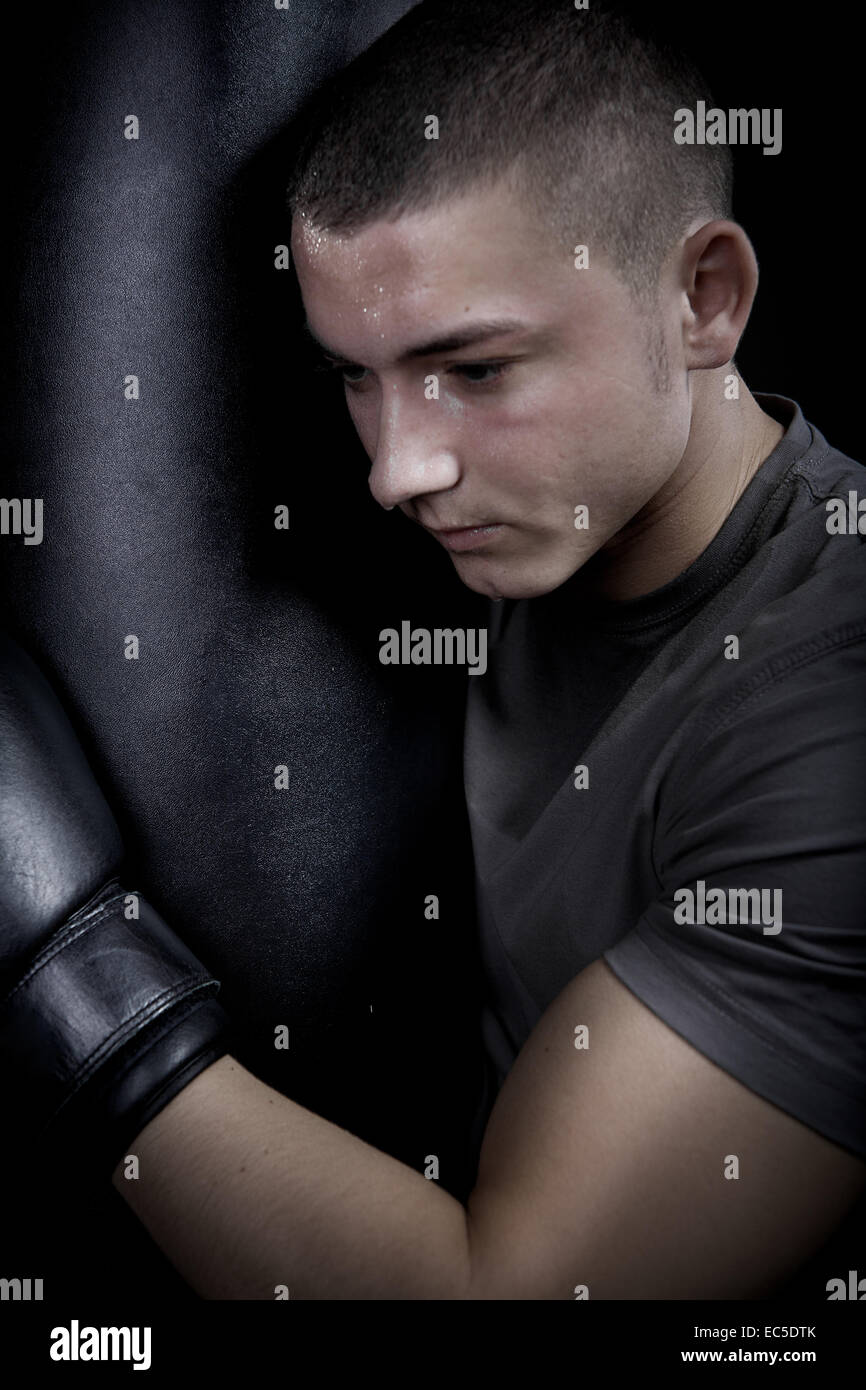 portrait of a young boxer in front of dark background Stock Photo - Alamy