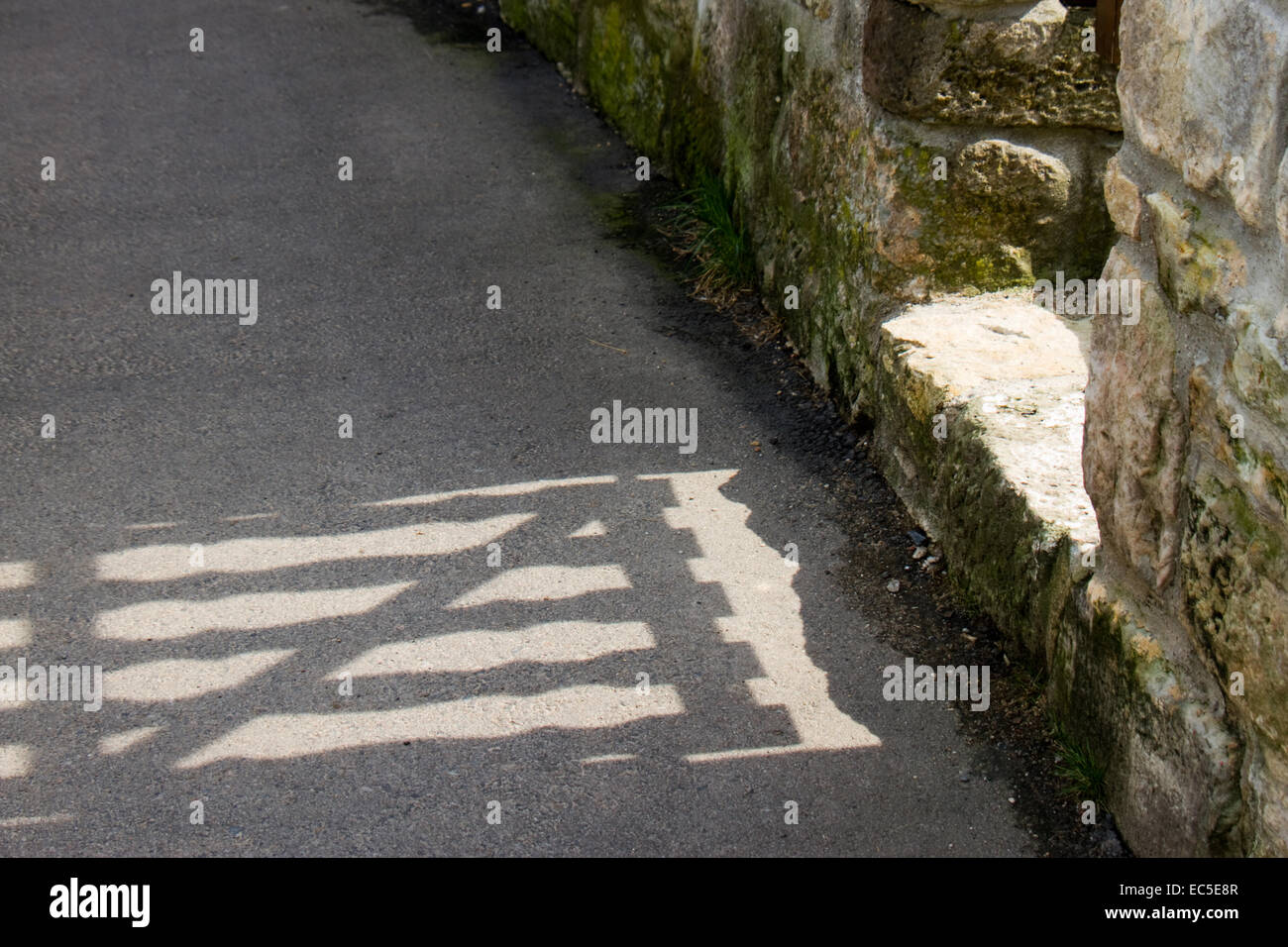 shadow of a gate Stock Photo - Alamy