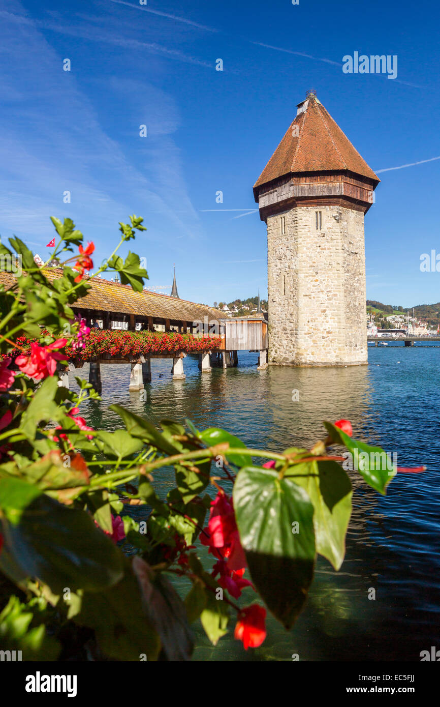 Chapel Bridge on the Reuss River with the Water Tower in the background ...