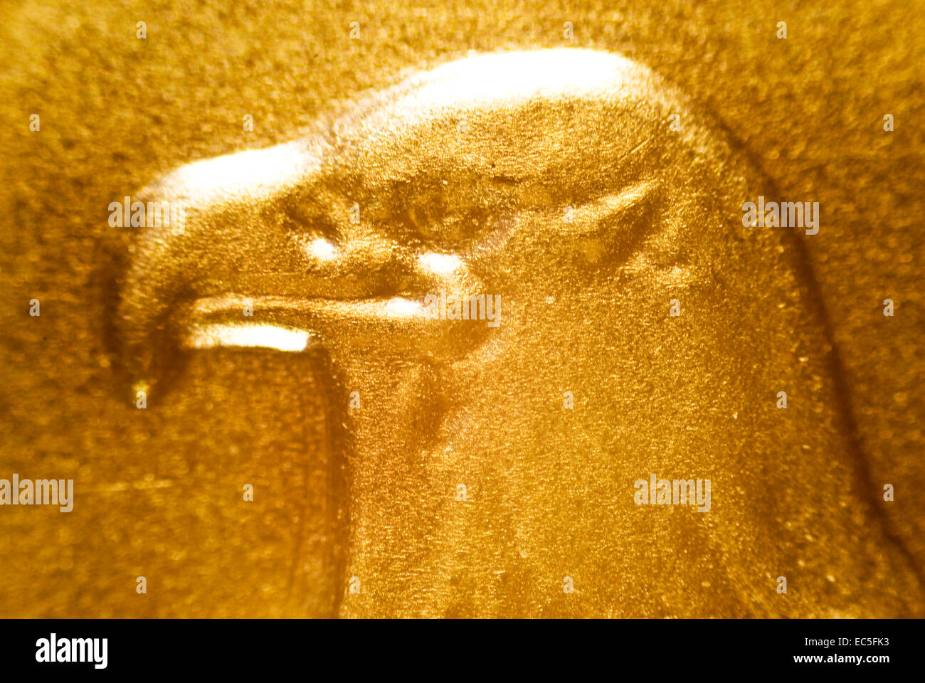 micro photo detail of a dollar gold coin Stock Photo - Alamy