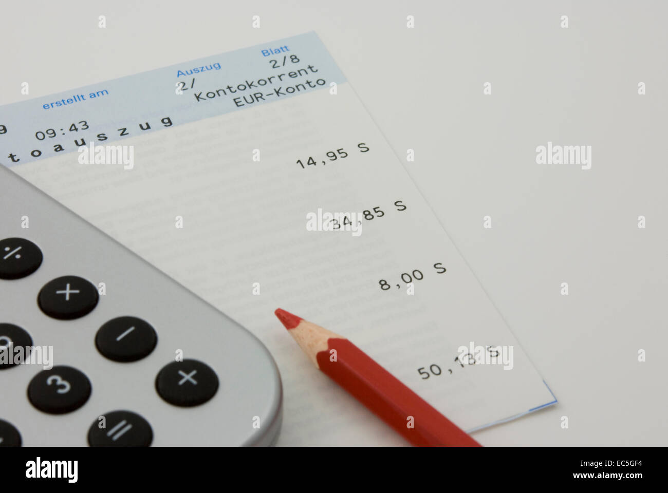 bank statement, red pencil and calculator Stock Photo - Alamy