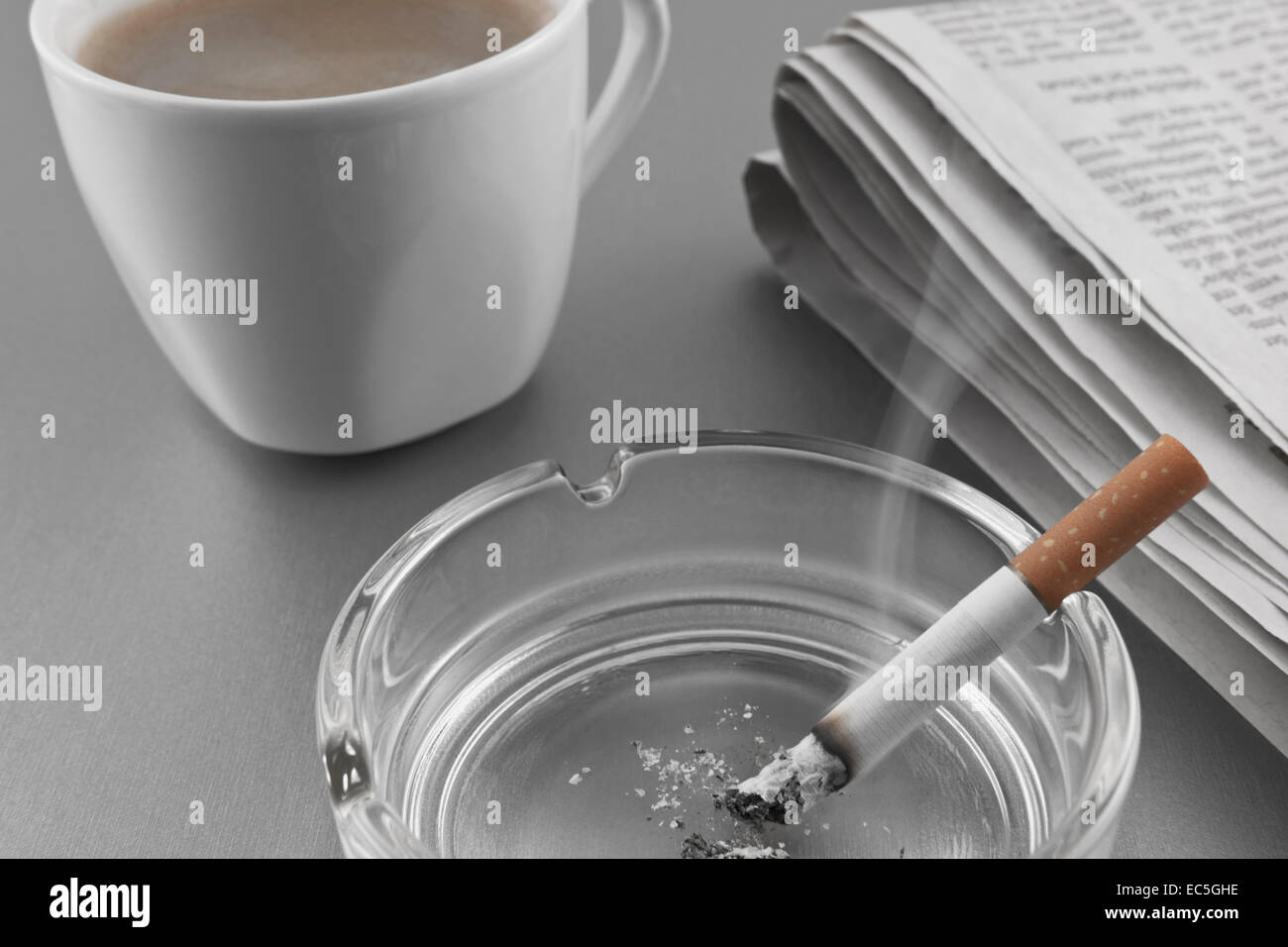 coffee, cigarette and a daily paper Stock Photo - Alamy