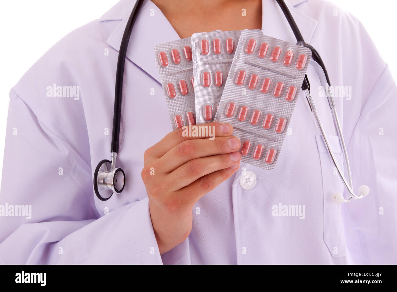 The young doctor with tablet packaging in the hand Stock Photo - Alamy