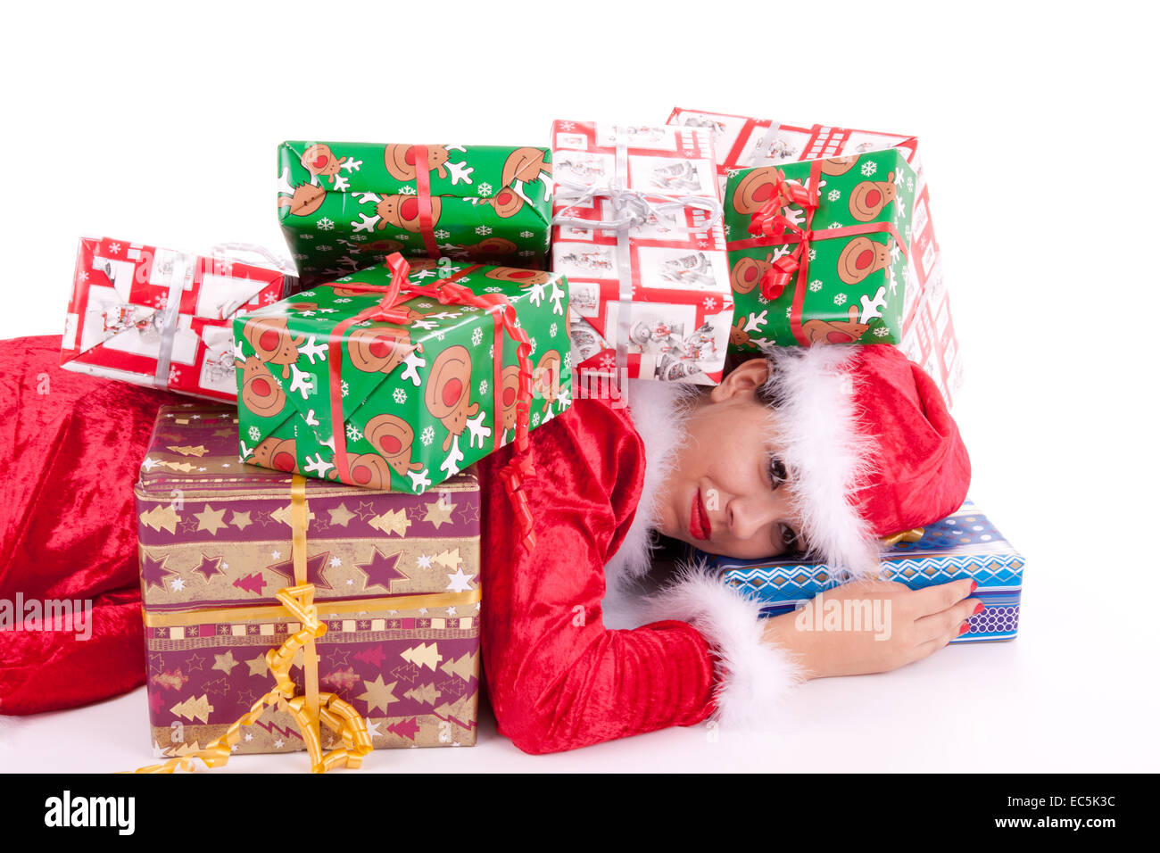 Santa Claus is lying on the floor and buried with gifts Stock Photo - Alamy