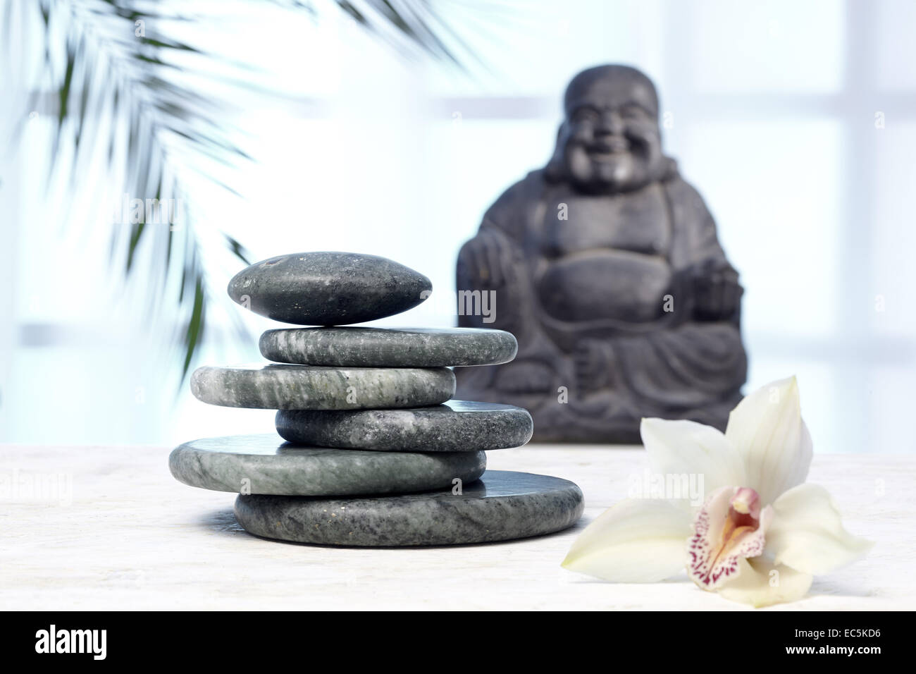 Massage, hot stones Stock Photo - Alamy