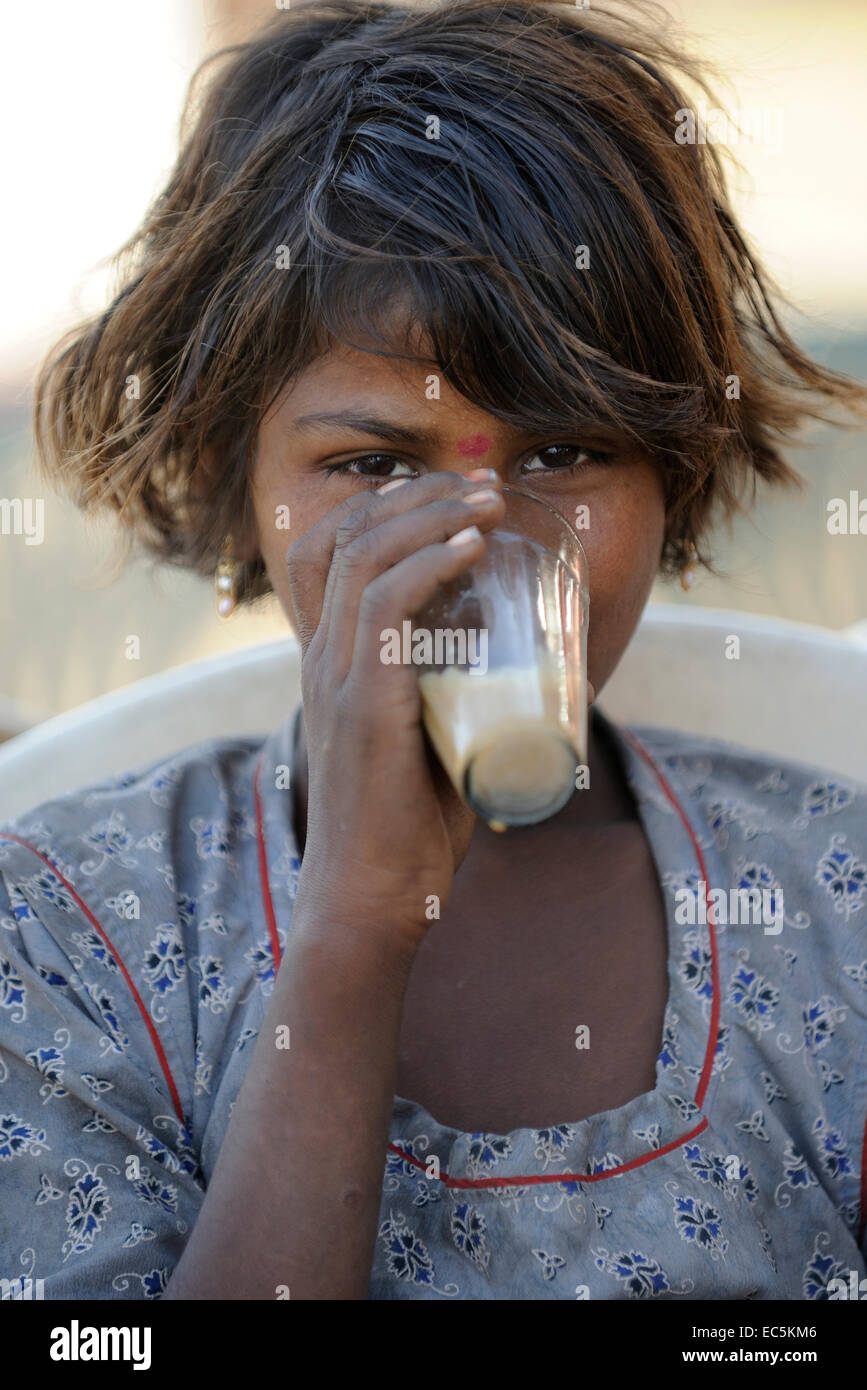 Indian girl drink milk tea Stock Photo - Alamy