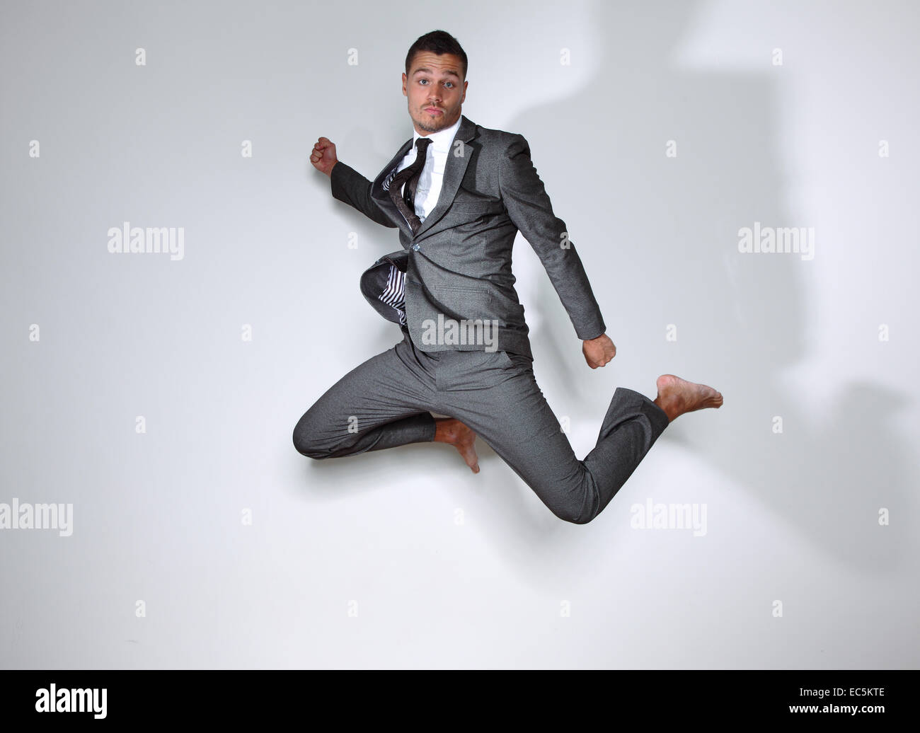 young man jumping Stock Photo - Alamy