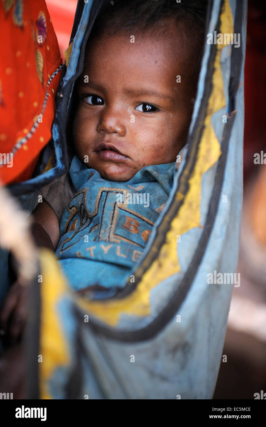 Cute baby in the cot Stock Photo - Alamy