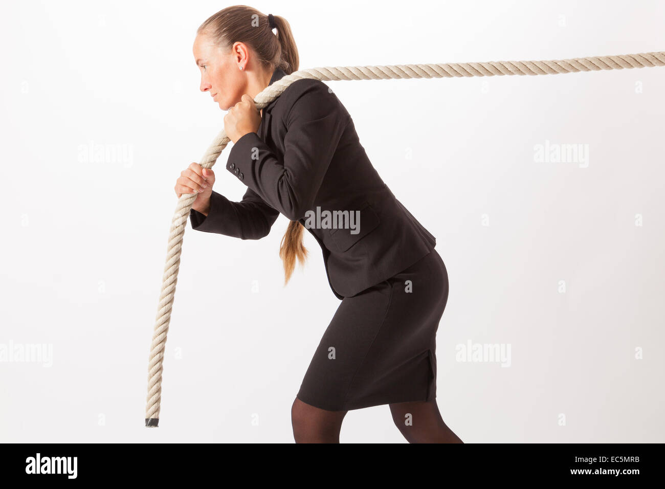 Person pulling rope hi-res stock photography and images - Alamy