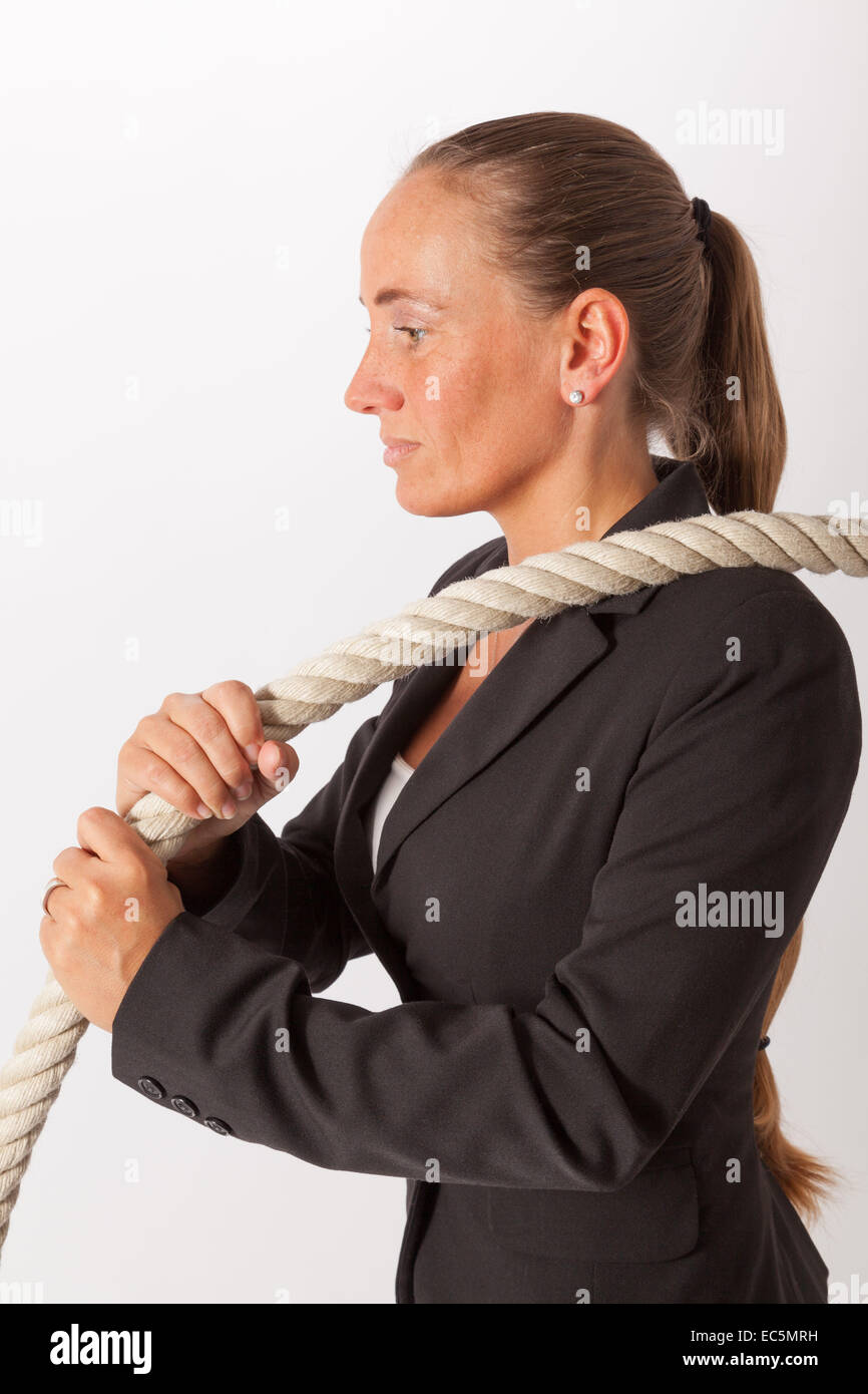 Person pulling rope hi-res stock photography and images - Alamy