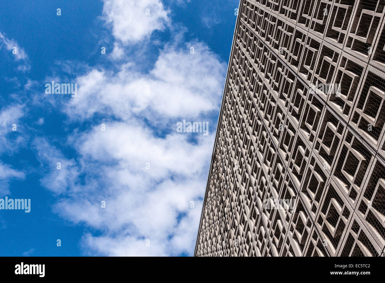 grey building blue sky Stock Photo - Alamy