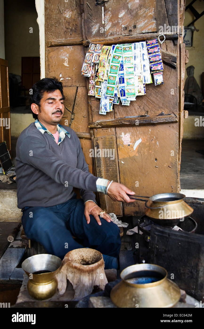 indian man cooks coffee on a market, North India, India, Asia Stock ...