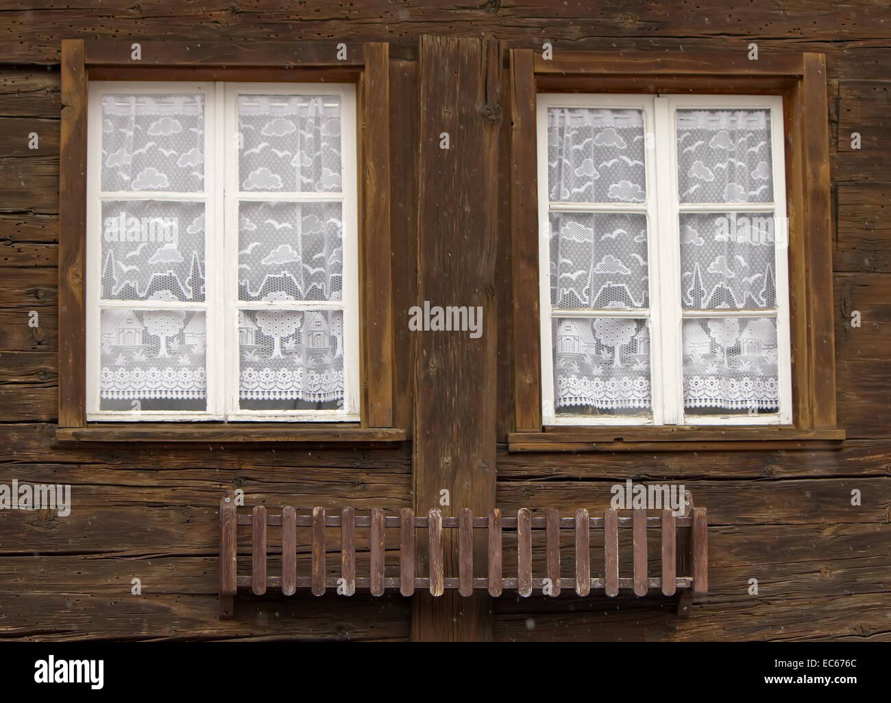 Two closed wooden windows with vintage white curtains inside Stock ...