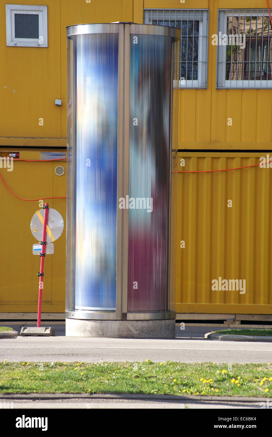Advertising pillar and Container Stock Photo - Alamy
