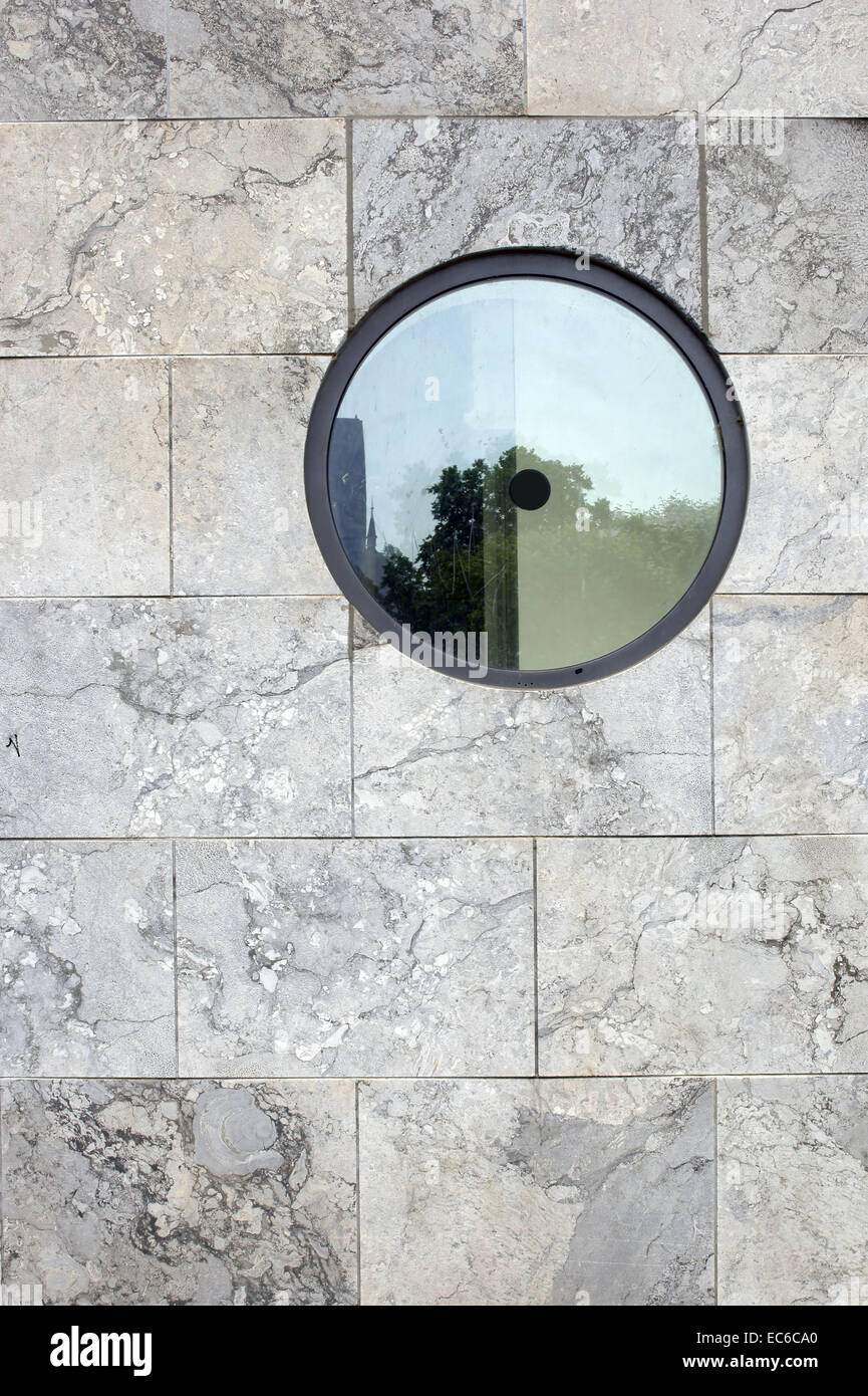 Wall with round window Stock Photo - Alamy