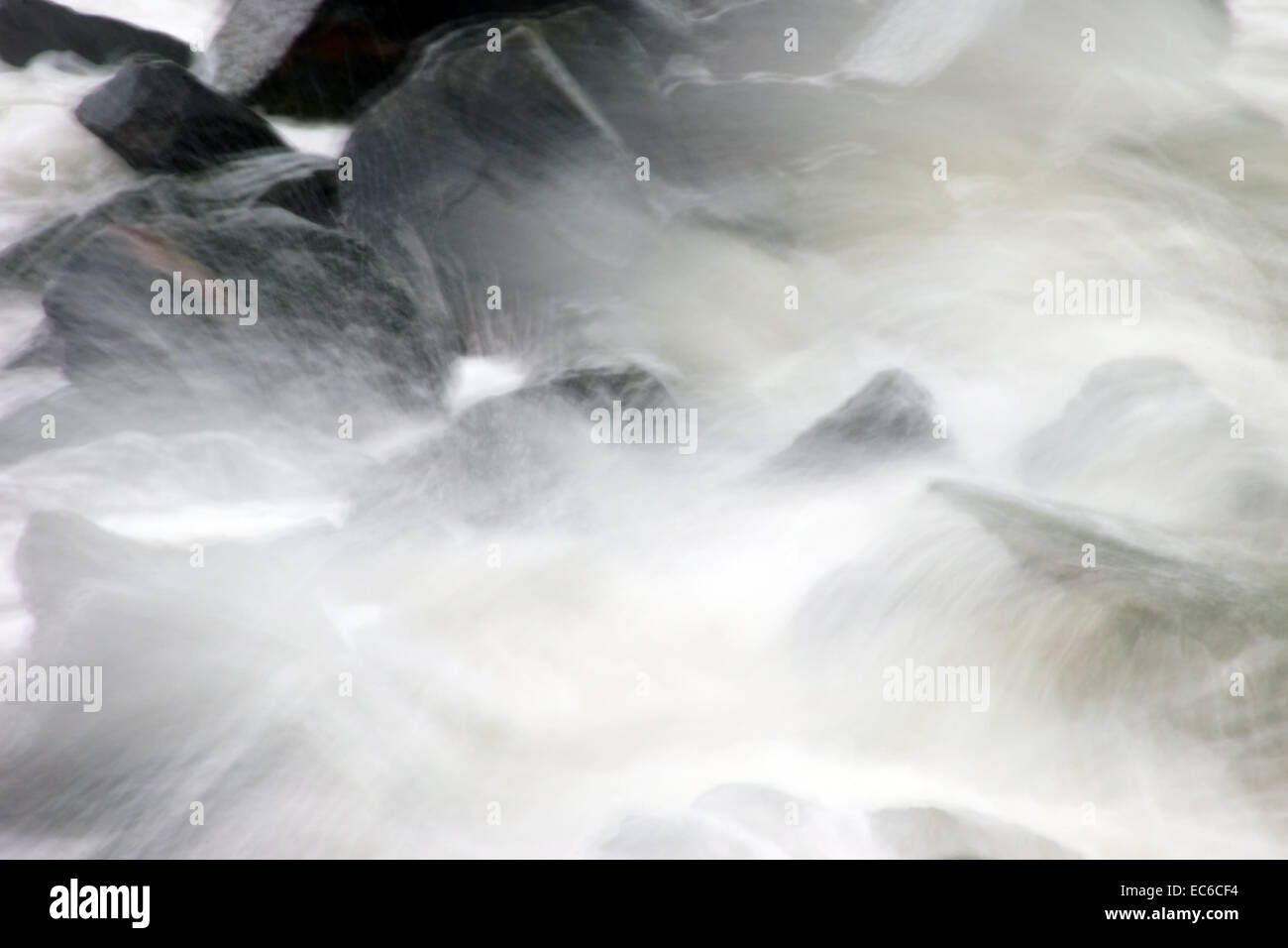Rushing sea water Stock Photo - Alamy