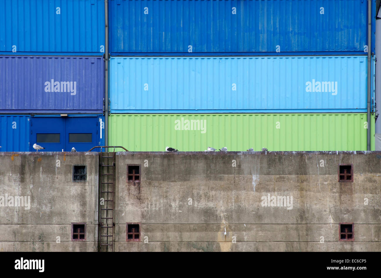 Pier with cargo containers Stock Photo - Alamy