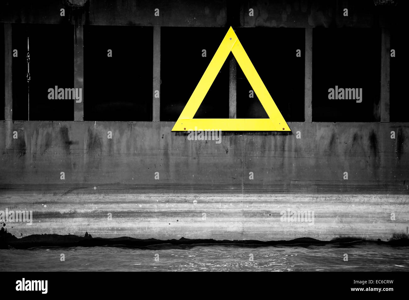 Yellow warning triangle Stock Photo - Alamy