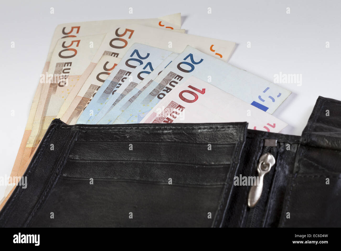 Purse with Euro notes Stock Photo - Alamy