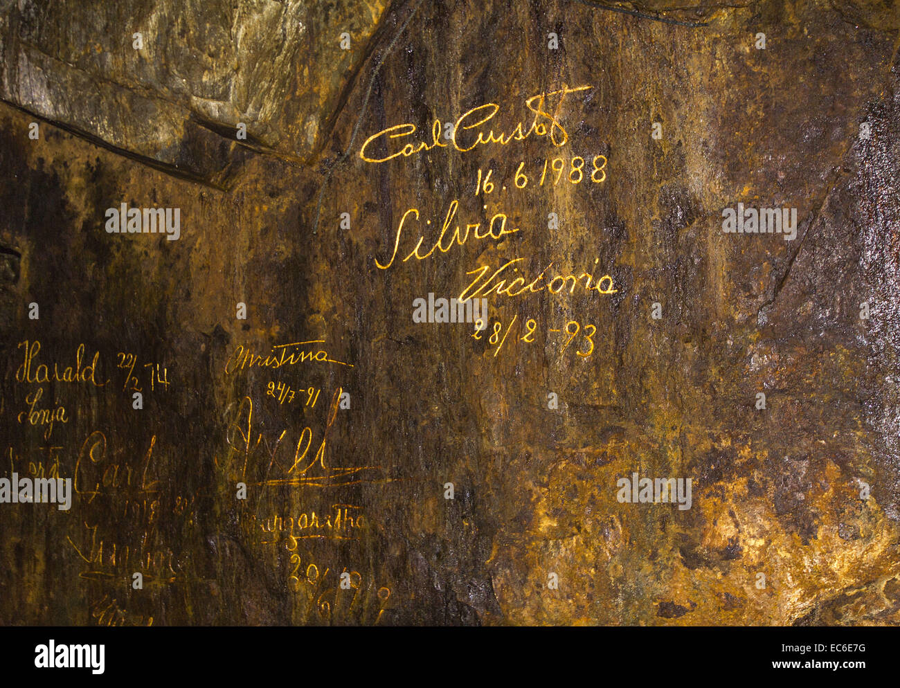 Signatures on a pit wall underground of noble visitors to the historic ...