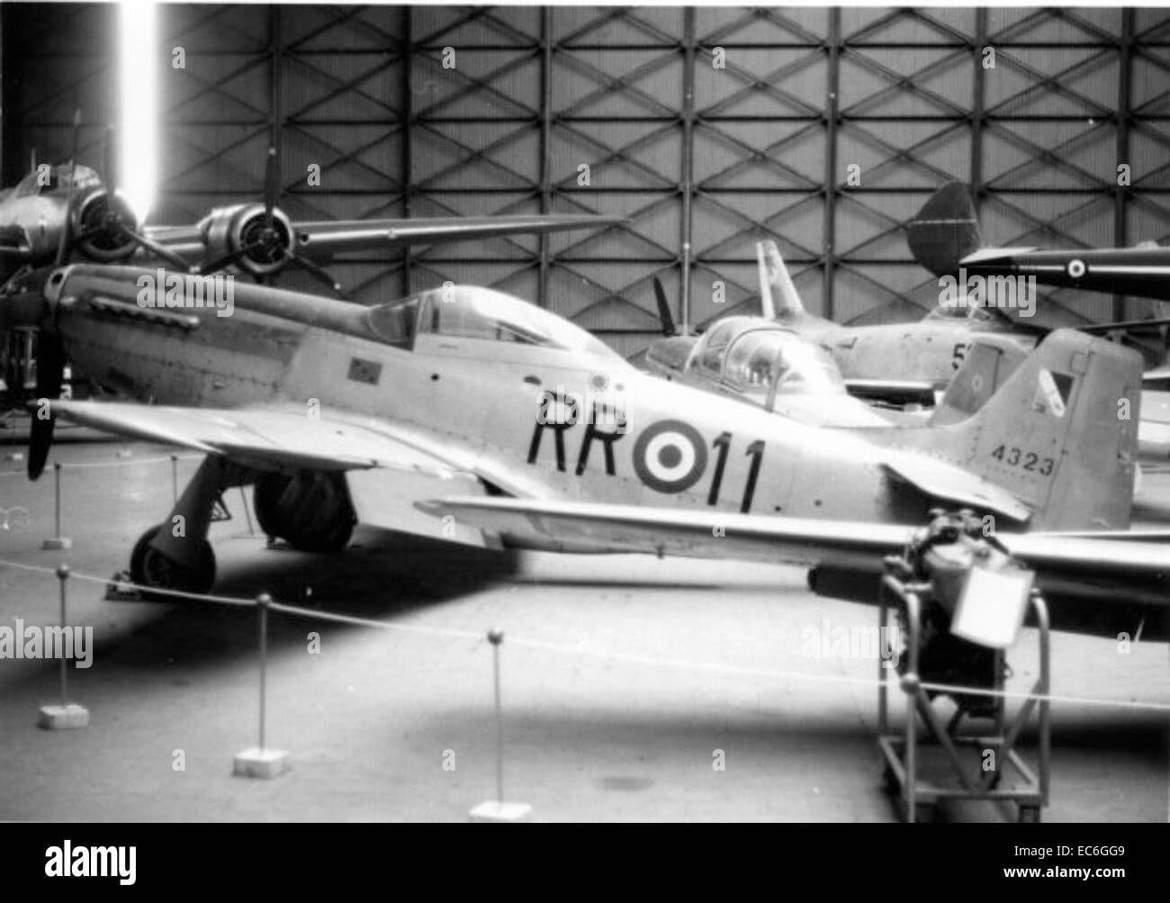 This image features the North American P-51 Mustang MM4323, a fighter ...