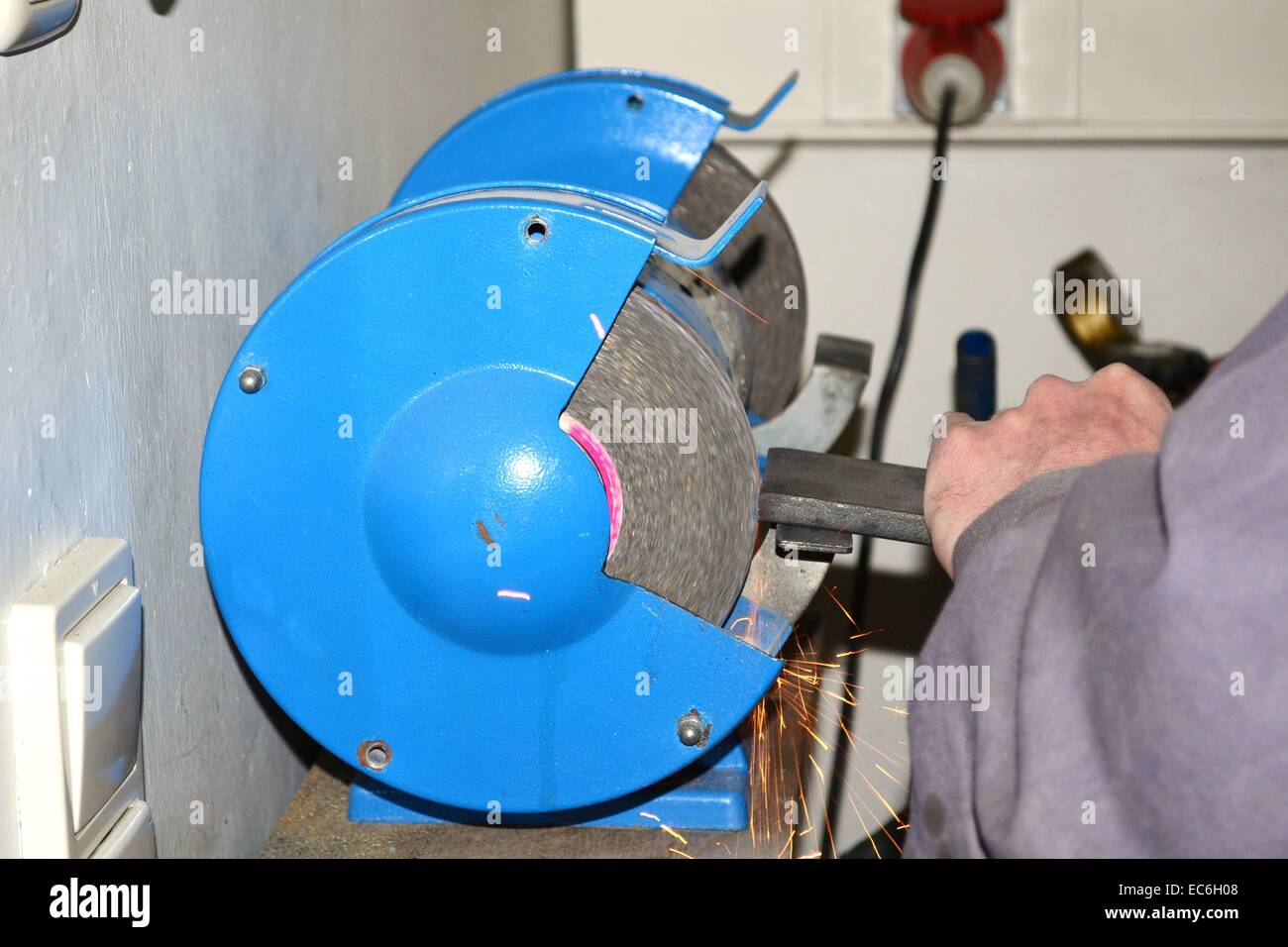 bench grinder with sparks Stock Photo - Alamy