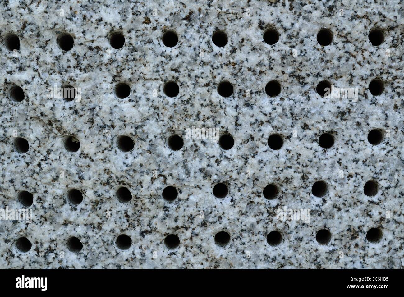 perforated granite stone slab Stock Photo - Alamy