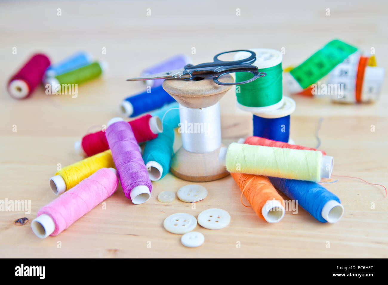 A variety of colorful sewing threads Stock Photo - Alamy