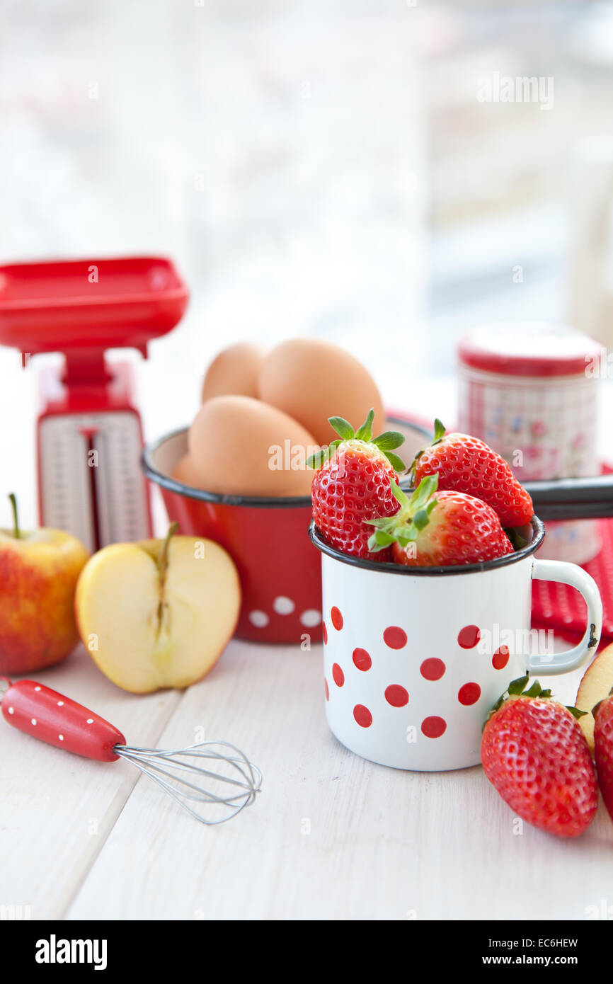 Ingredients for baking with fresh apples and strawberries Stock Photo ...