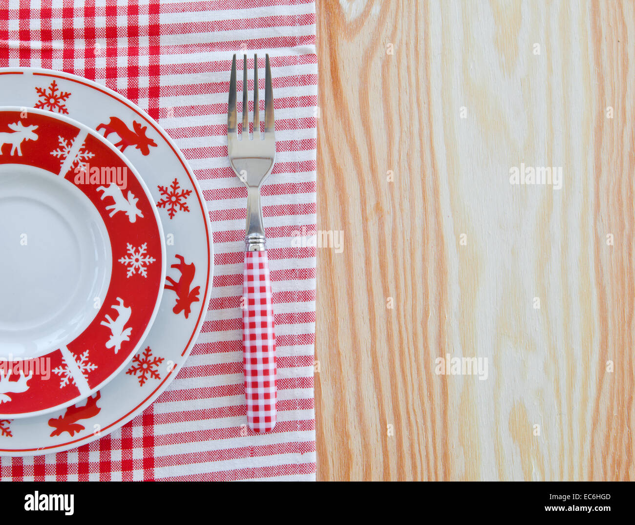 Wooden background with christmas plates Stock Photo - Alamy