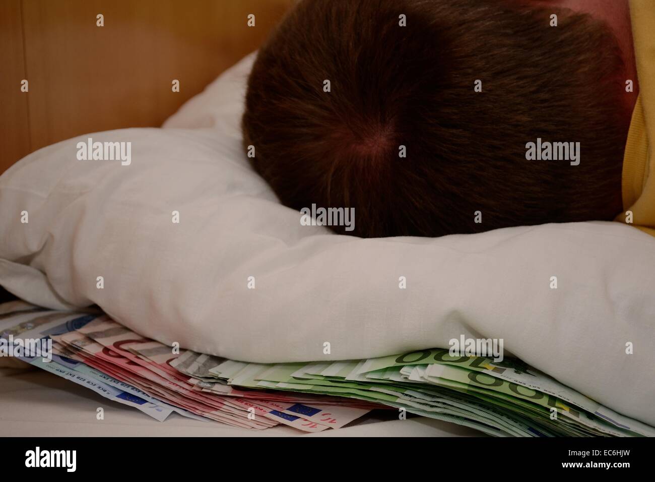 Money under pillow hi-res stock photography and images - Alamy