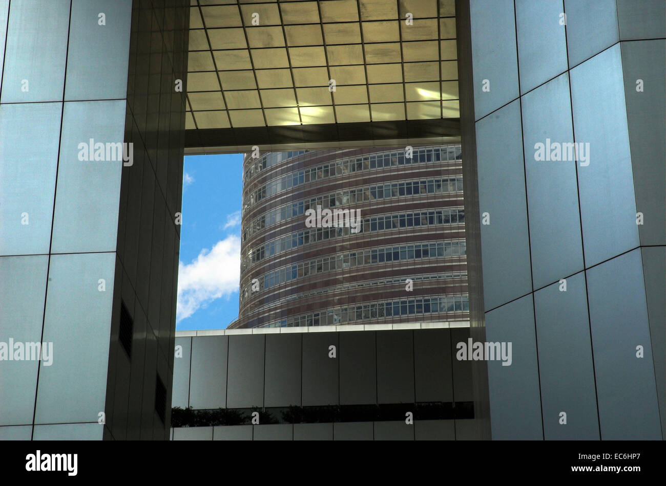 Abstract of buildings through a gap in another building Stock Photo - Alamy