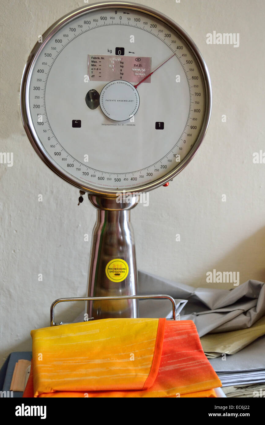 With scale material is weighed Stock Photo - Alamy