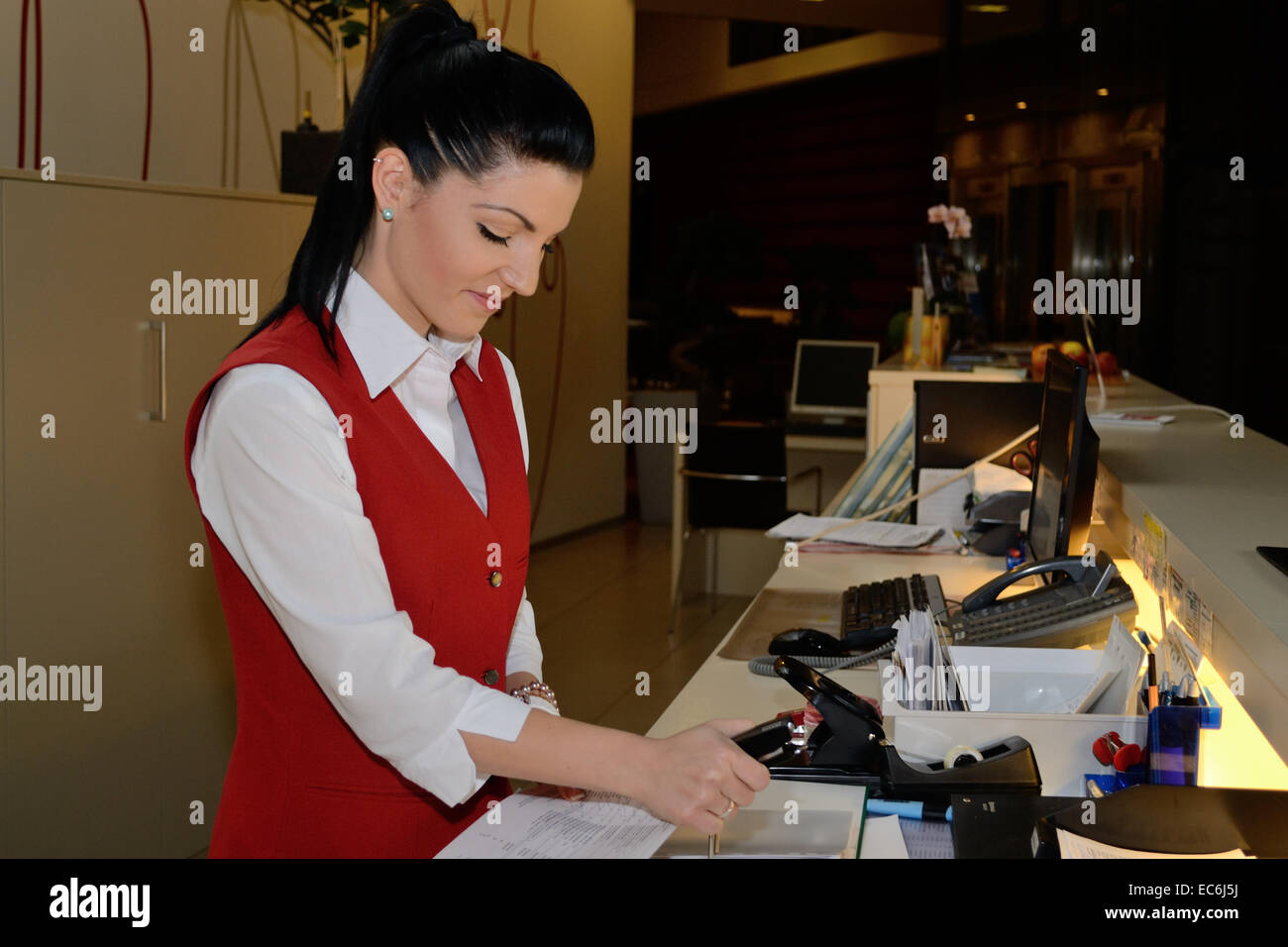 Receptionist classified documents Stock Photo - Alamy