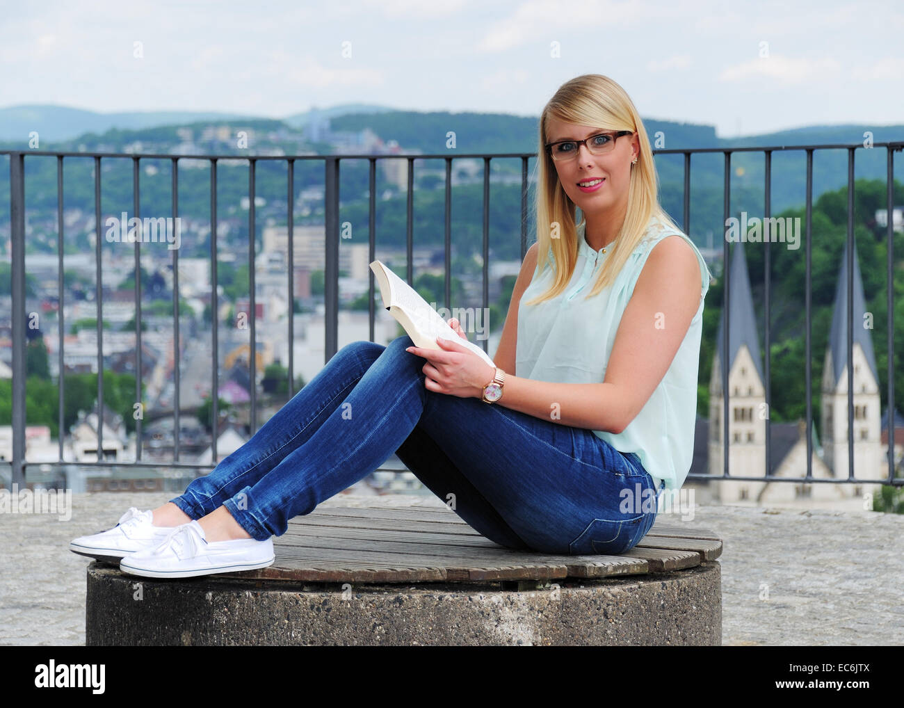 Woman in front of castle hi-res stock photography and images - Alamy