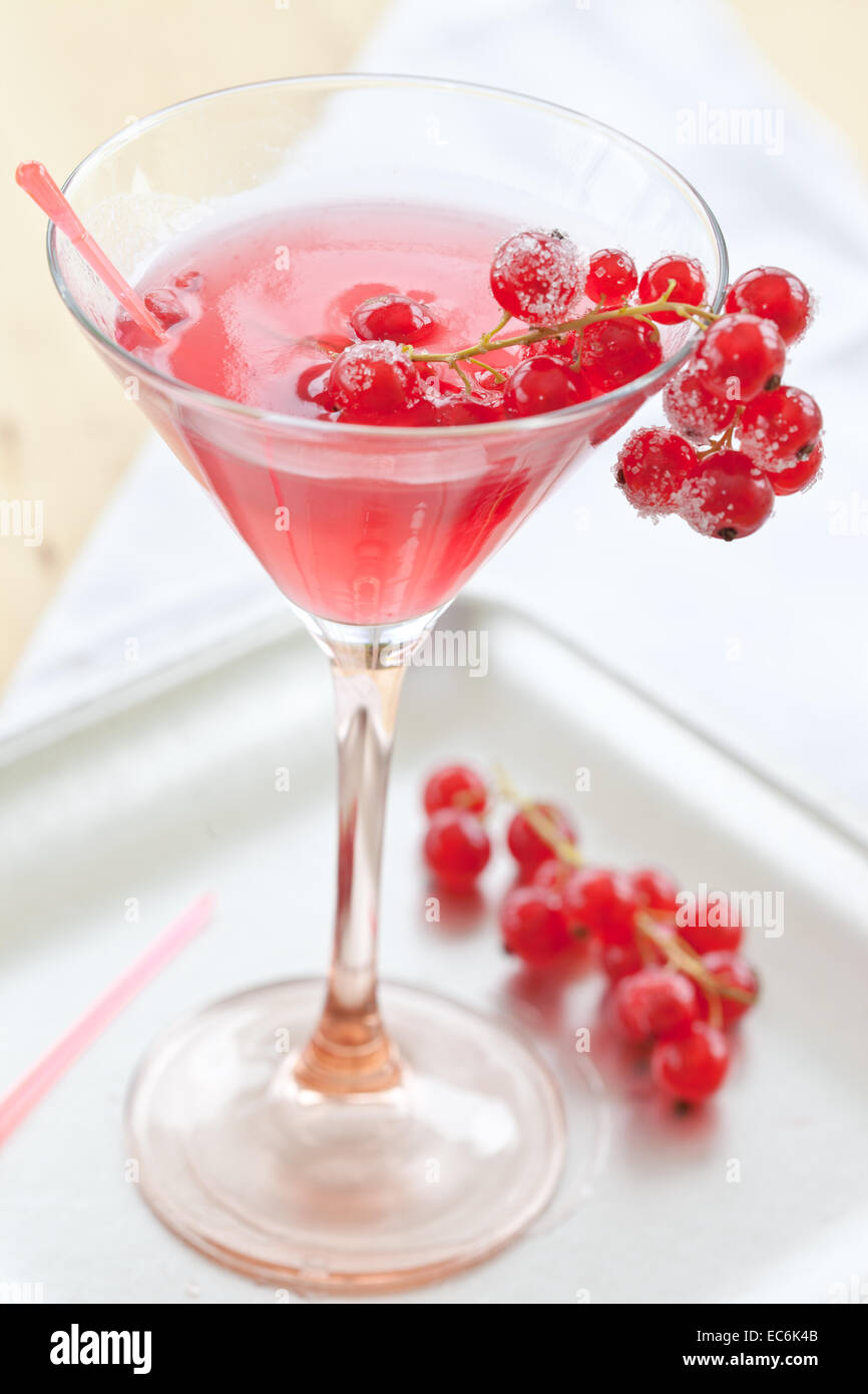 Pink cocktail with red currant Stock Photo - Alamy
