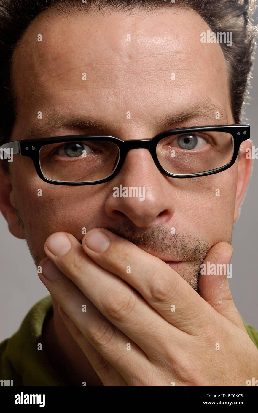 Man With Hand Over Mouth Stock Photo Alamy man-with-hand-over-mouth-stock-photo-alamy