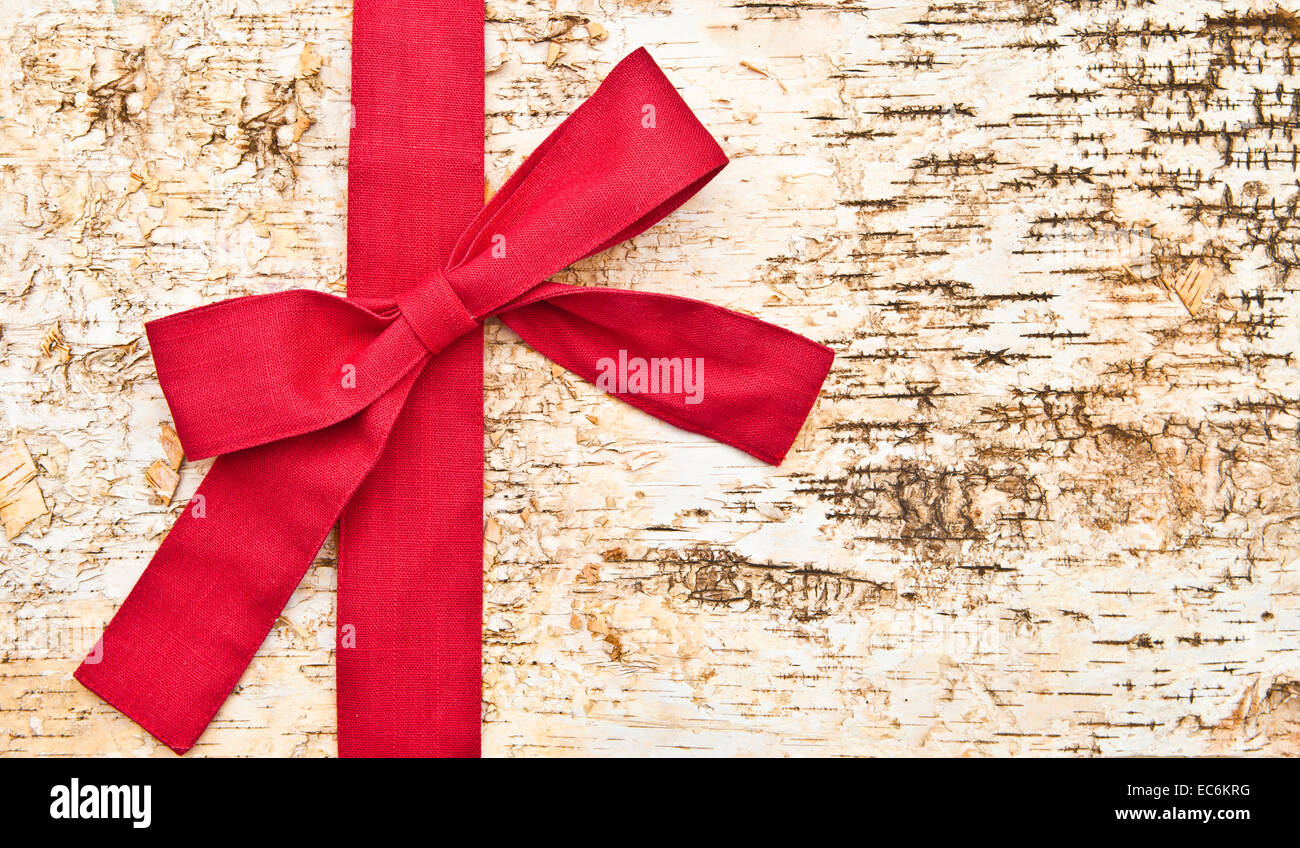 Wooden background with red ribbon Stock Photo - Alamy