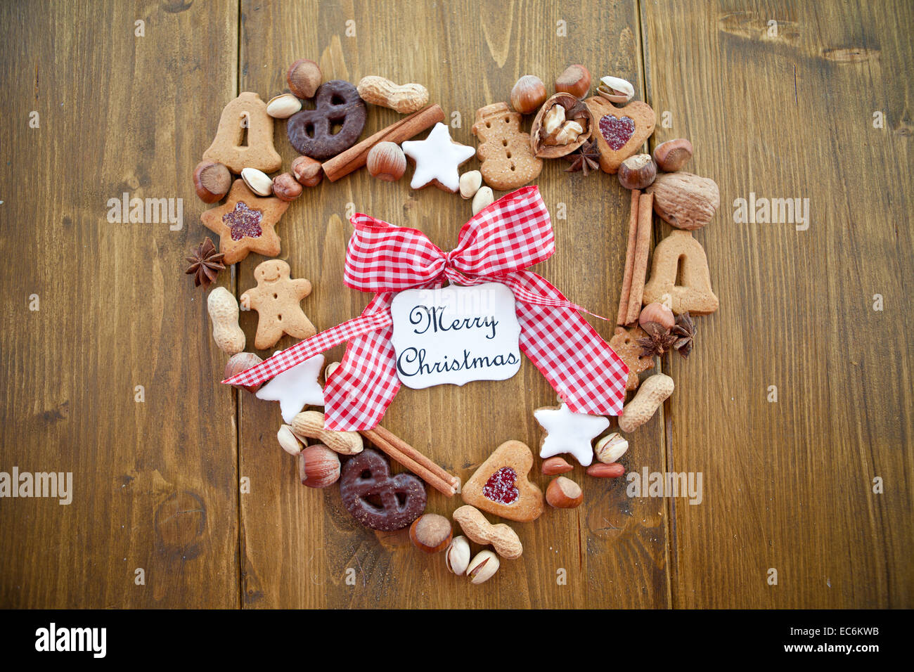Heart-shape made out of Christmas Cookies and Nuts Stock Photo - Alamy