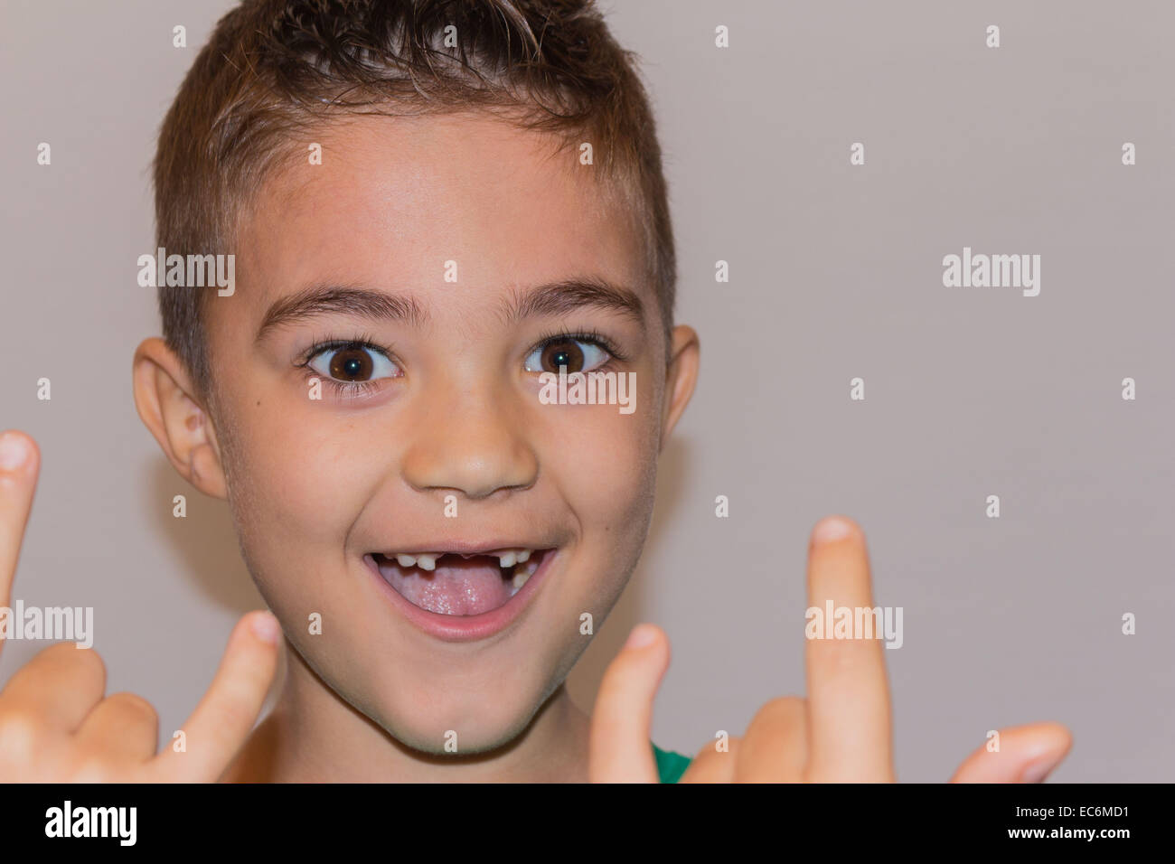 Excited face of a small boy Stock Photo - Alamy