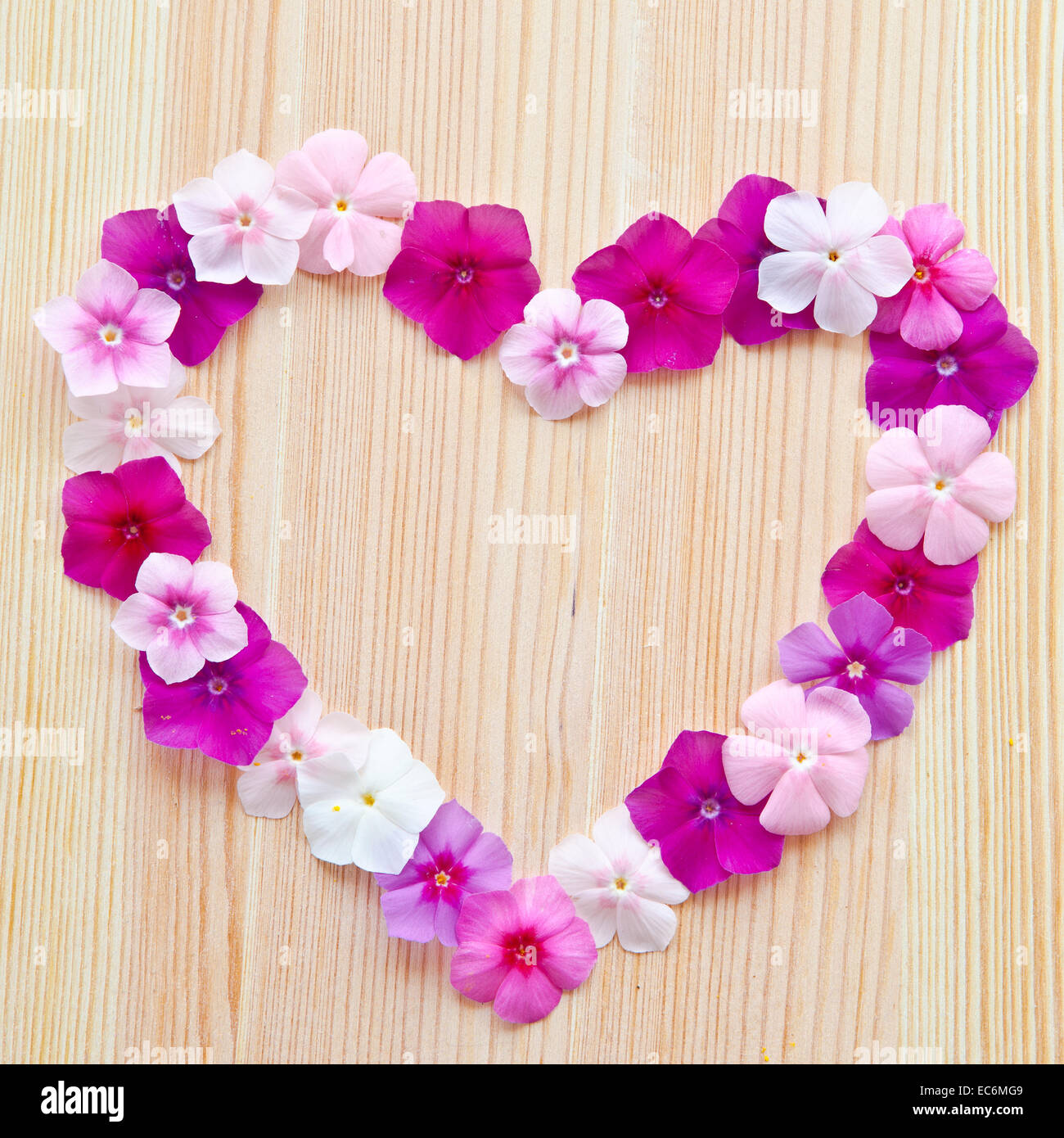 Romantic heart made of flowers Stock Photo - Alamy