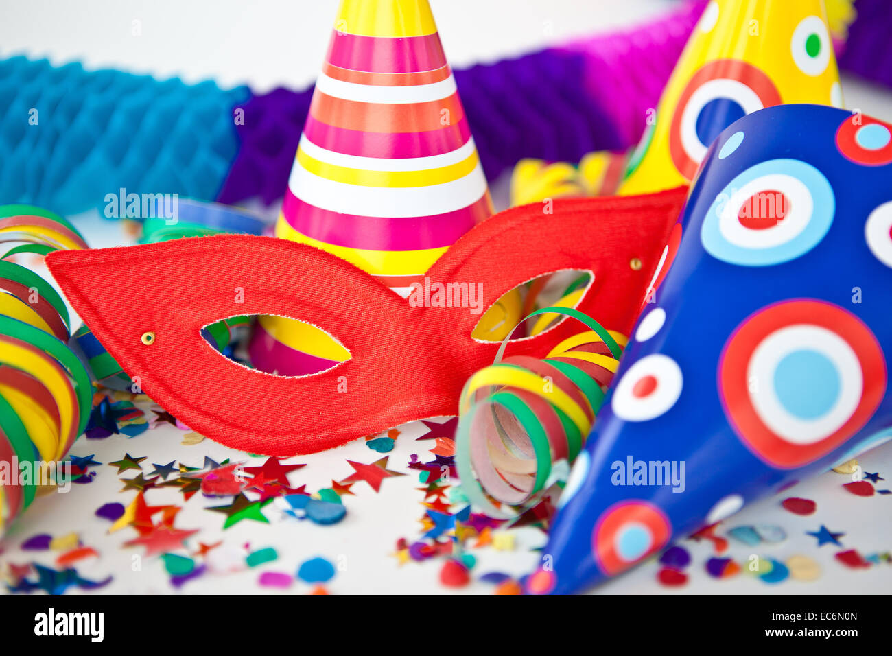 Colorful party props and confetti Stock Photo - Alamy