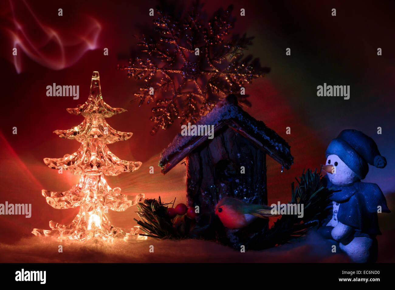 Christmas scene with Christmas Tree, snowman and robin on branch Stock ...