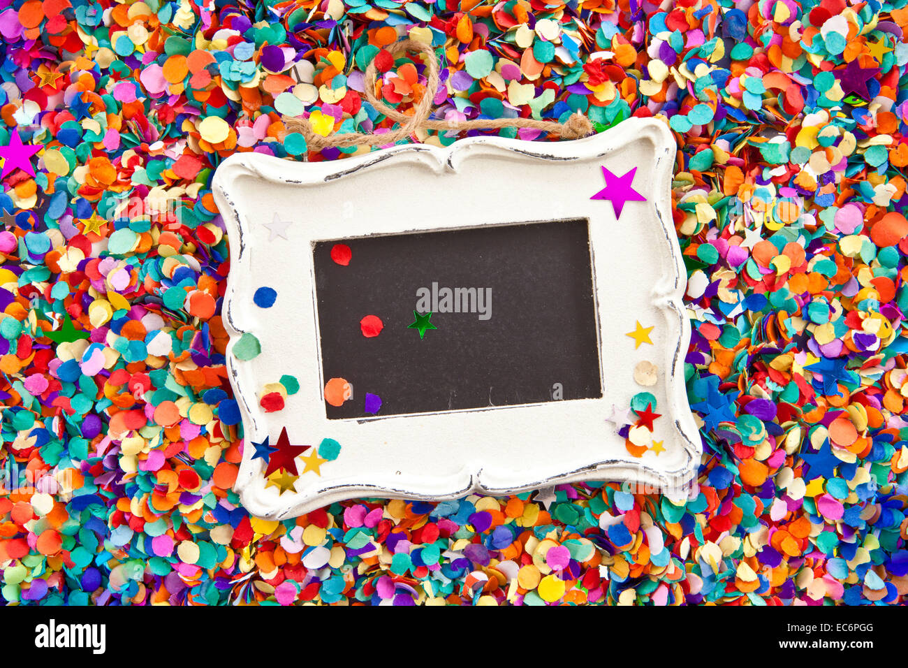 Chalkboard on confetti Stock Photo - Alamy