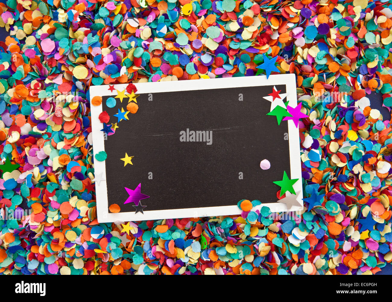 Chalkboard on confetti Stock Photo - Alamy