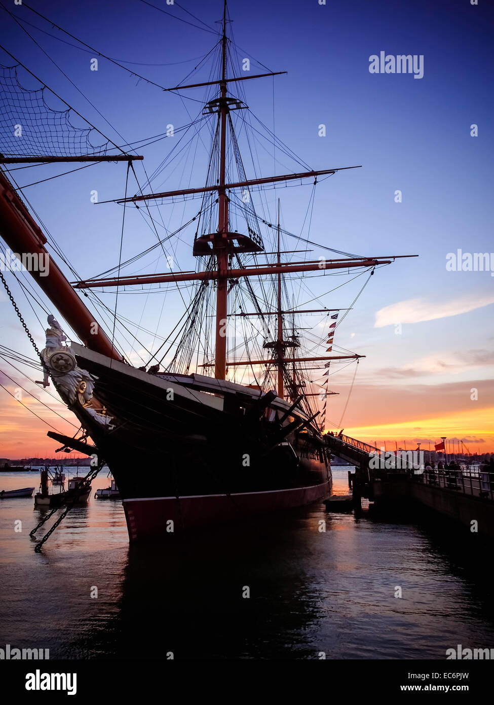 HMS Warrior at sunset in Portsmouth Historic Dockyard, England Stock ...