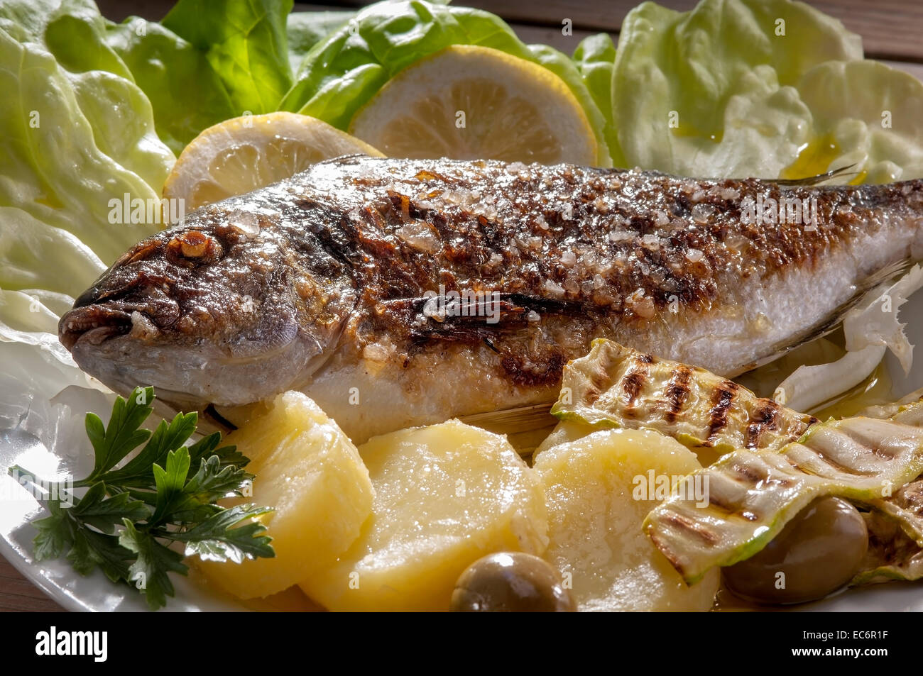 Bream fish grill grilled potato hi-res stock photography and images - Alamy