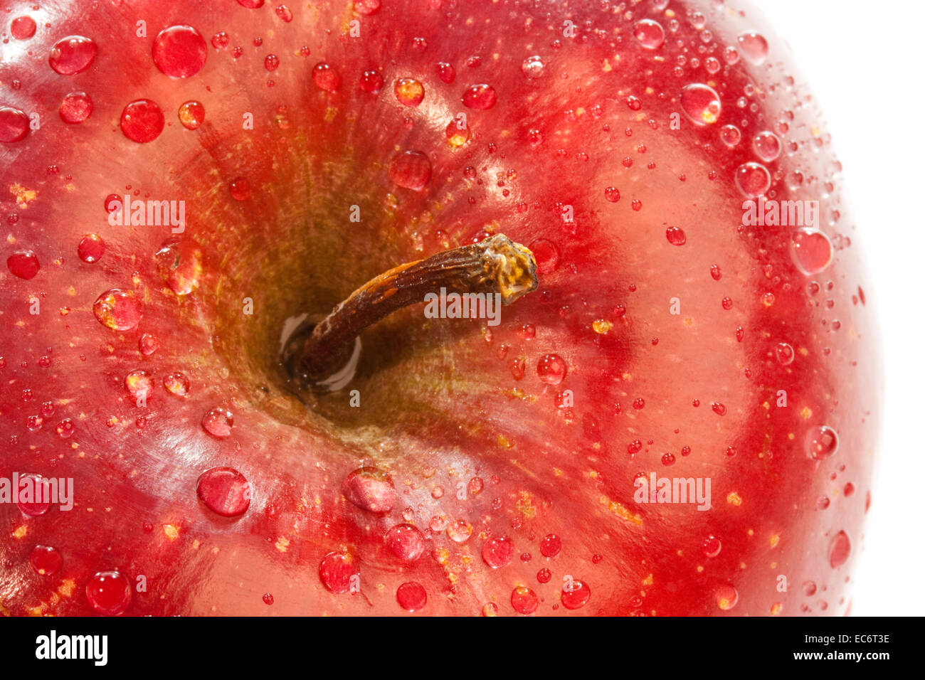 Closeup of a red apple with water drops Stock Photo - Alamy